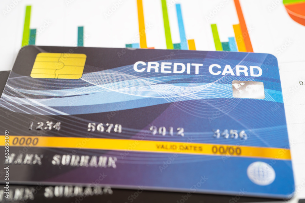 Credit card model on chart and graph spreadsheet paper. Finance ...