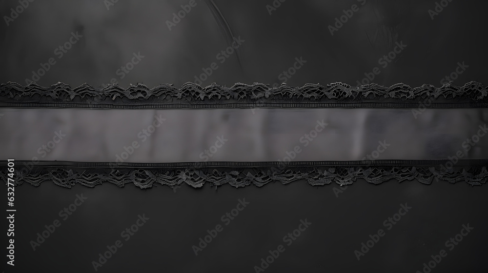 Black denim background with lace borders and small leather label. Dark ...