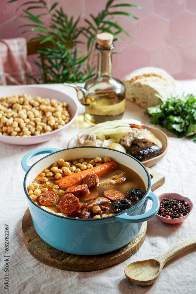 Cocido Madrileño, a traditional Spanish meal, chickpea-based stew from ...