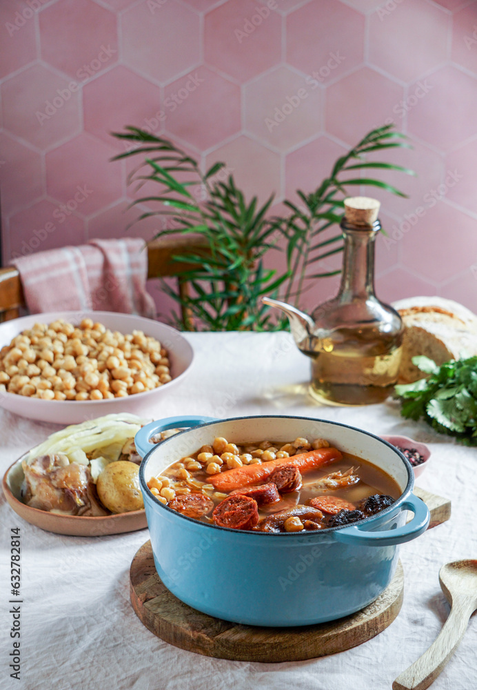 Cocido Madrileño, a traditional Spanish meal, chickpea-based stew from ...