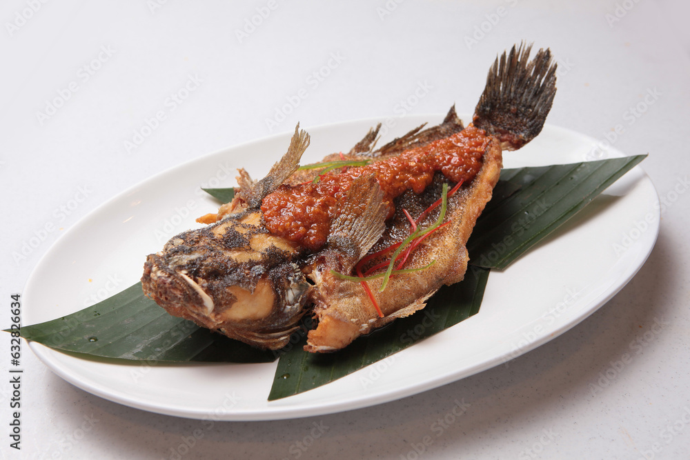 deep fried whole red grouper fish seafood with peranakan nonya spicy ...