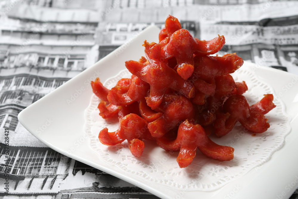 grilled red bbq Taiwanese mini sausages hot dog salad in plate on grey ...