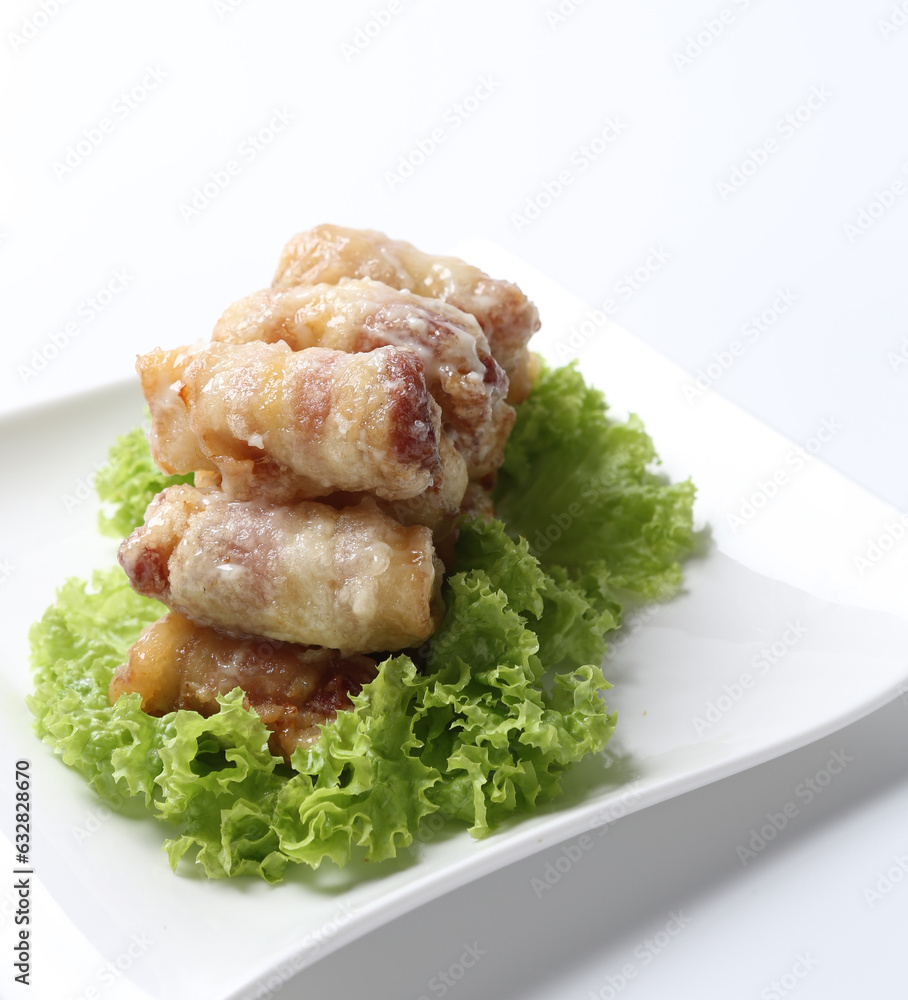 crispy deep fried bacon roll meat sausage with mayonnaise in plate on ...