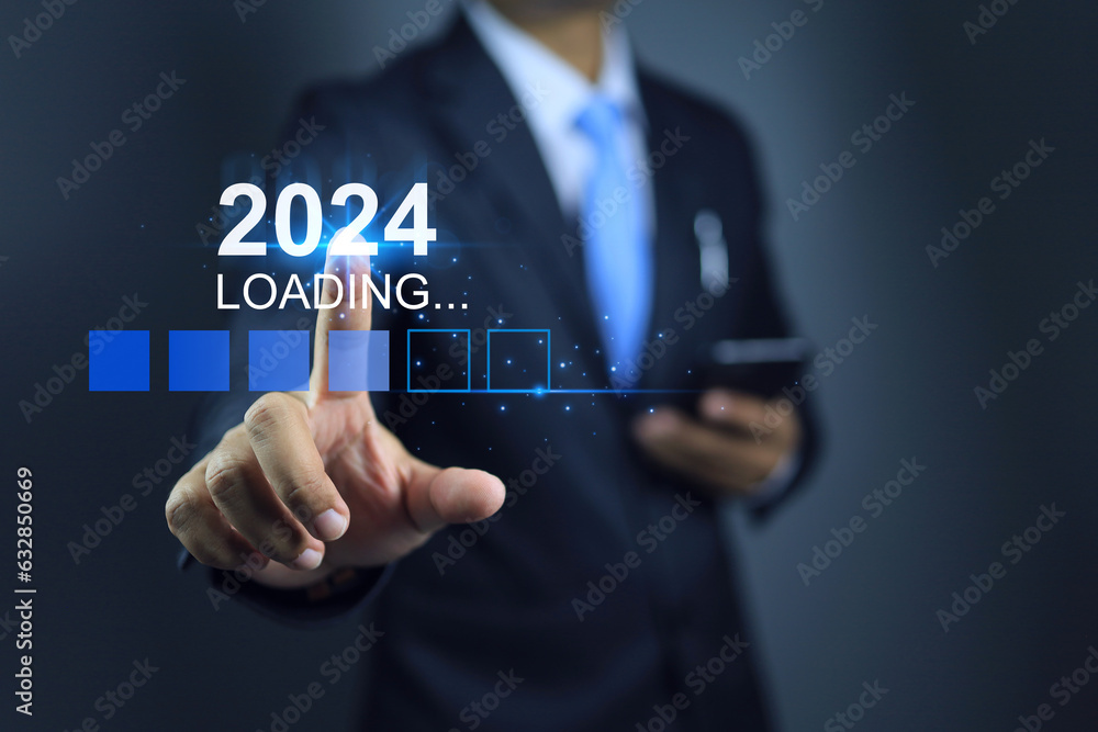 Businessman holding smart phone and touching on loading for new year ...