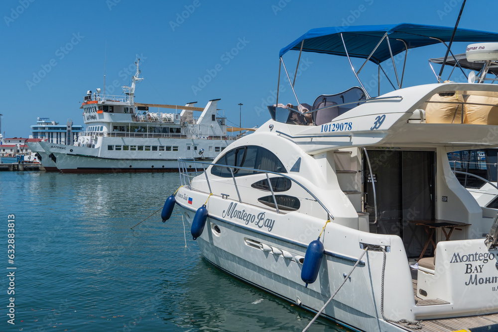 Sochi sea trade port. Motor ships and yachts on the pier in front of ...