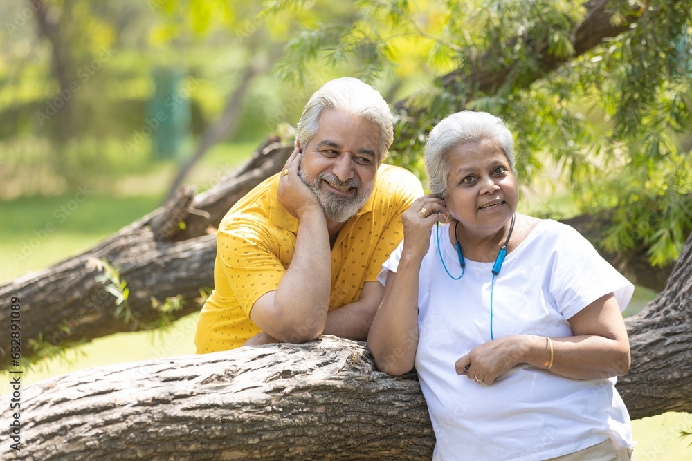 happy Indian senior couple together spending time at park. Stock Photo ...