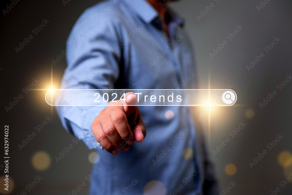 Trends for 2024 concept, Businessman searching for 2024 trends for ...