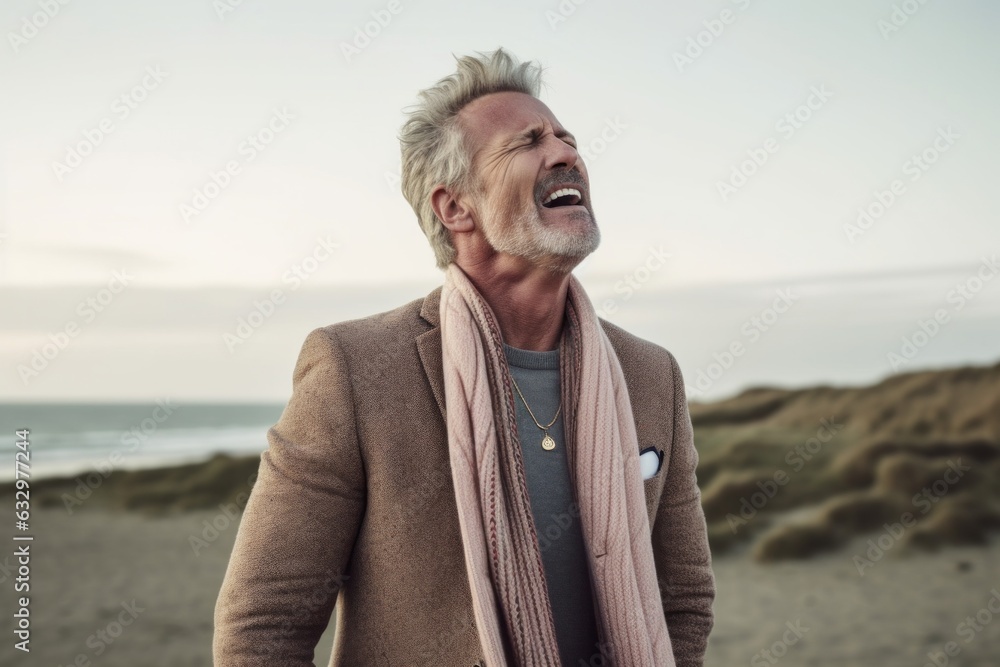 Lifestyle portrait photography of a man in his 50s wincing with pain ...