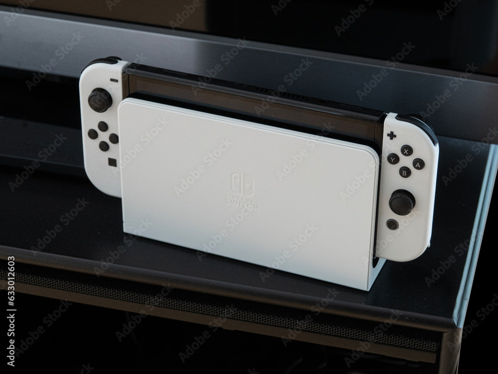 Nintendo Switch – OLED Model in handheld mode. Popular mobile gaming ...