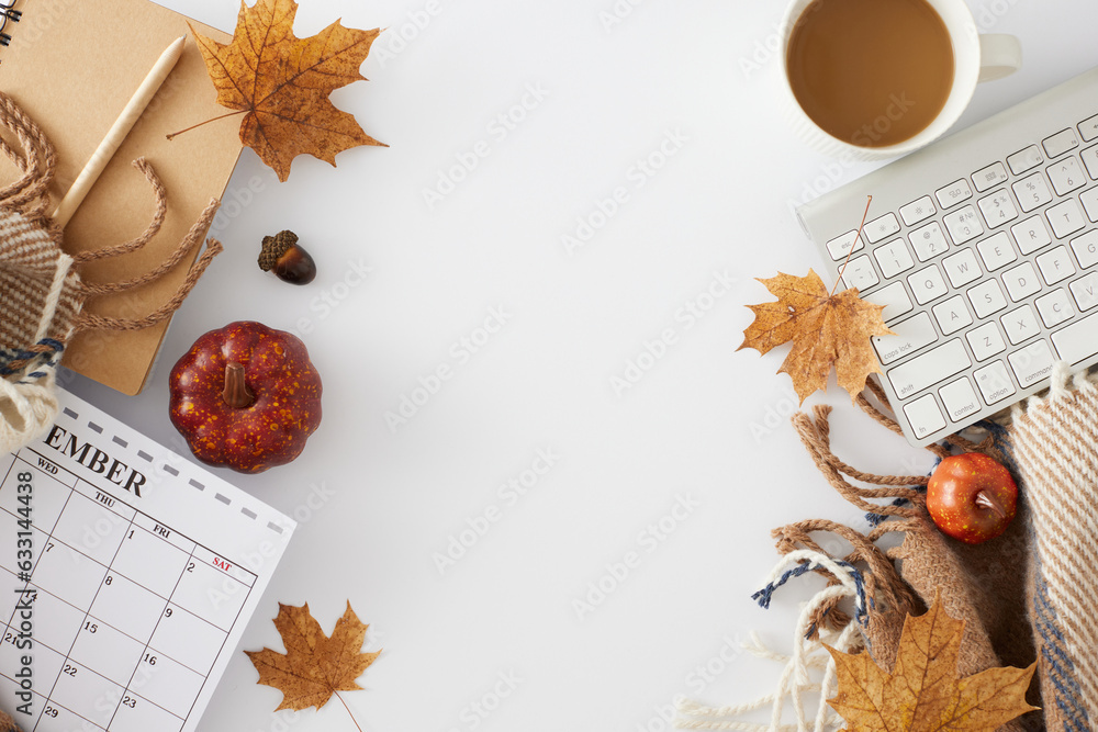 Fall-inspired workspace. Top view arrangement of calendar, pen, notepad ...