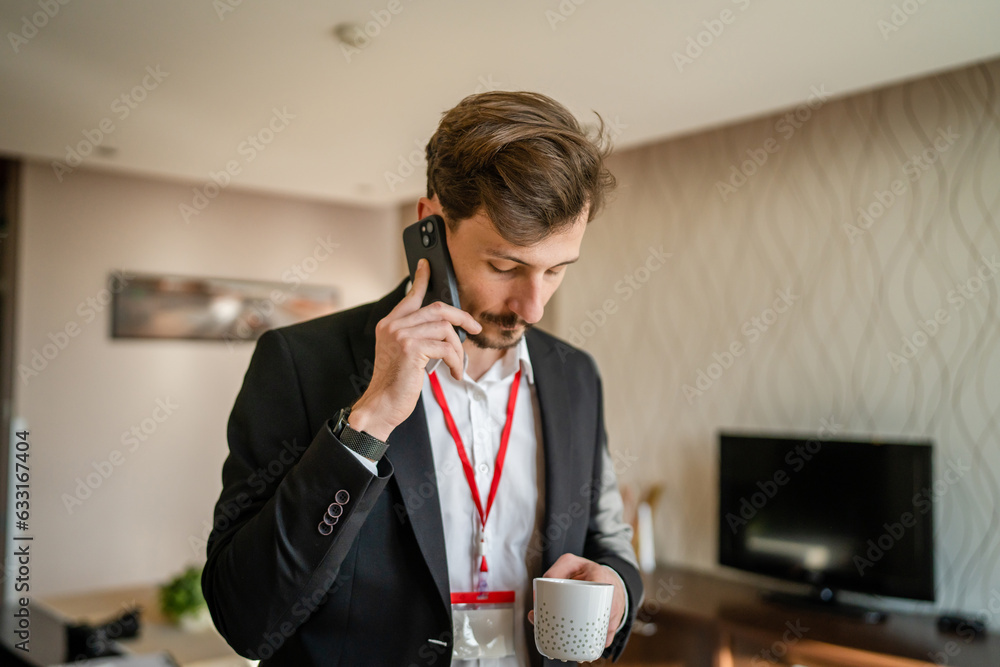 one man adult caucasian businessman wear suit in hotel room while ...