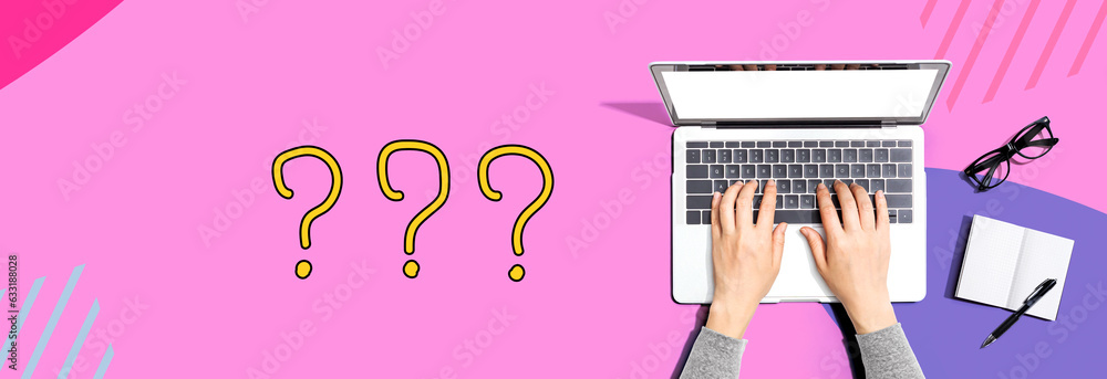 Question marks with person using a laptop computer Stock Photo | Adobe ...