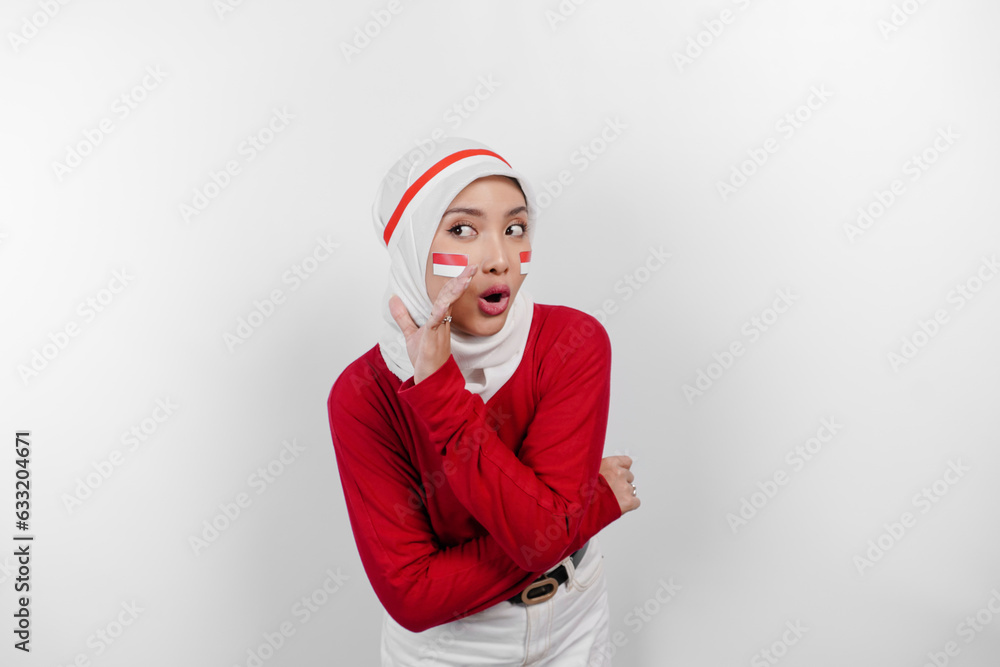 Young beautiful muslim woman wearing a red top and white hijab is ...