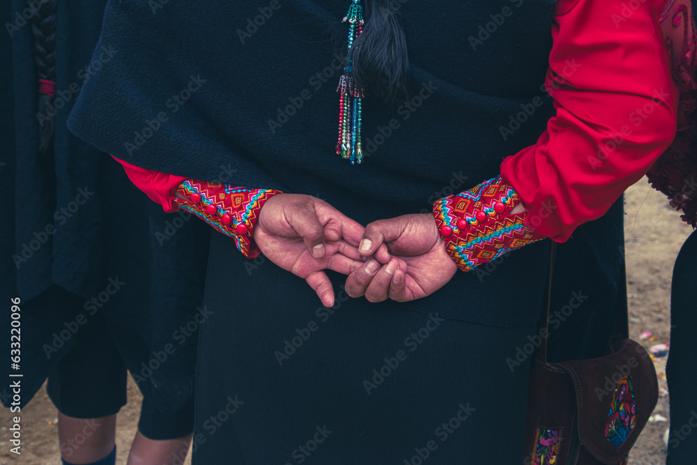 Embroidered details of the clothing of the indigenous woman Saraguro ...