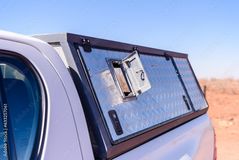 Foto de Flap on the side of a pick-up truck canopy, which should be ...