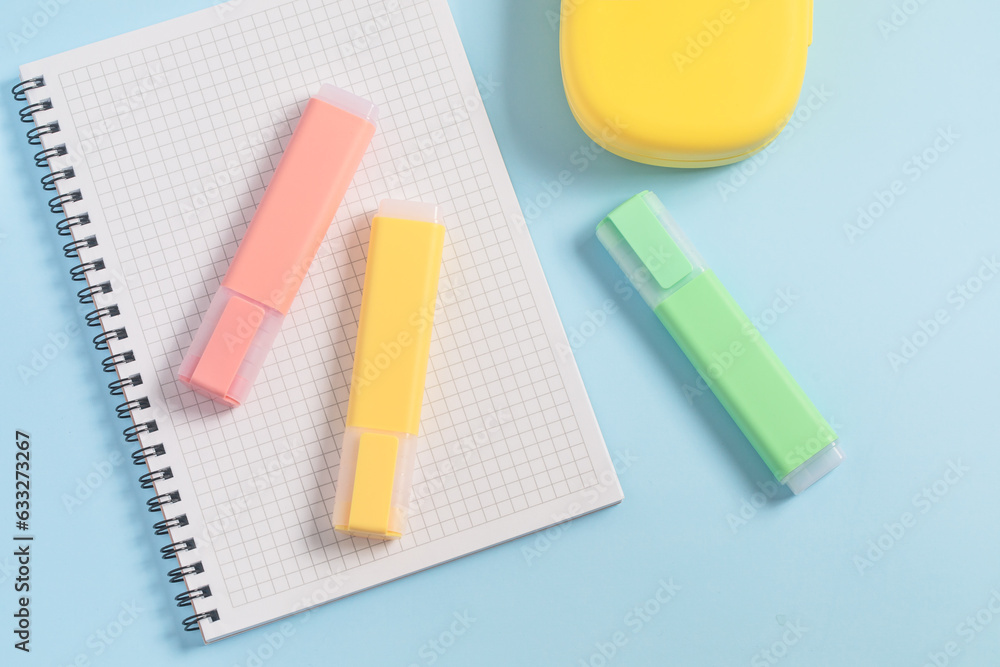 School supplies, back to school, multi-colored markers and notebooks on ...