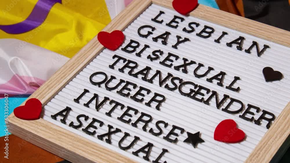 Video „Zoom in out LGBTQIA description frame on Rainbow LGBTQIA flag ...