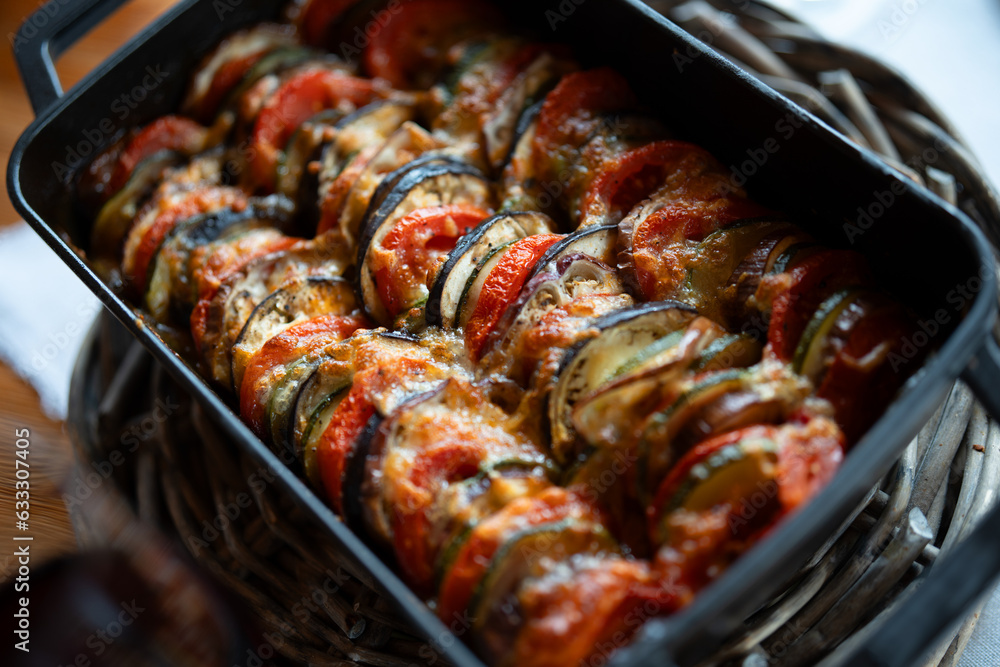 Vegetable ratatouille in a rectangular casserole of cast iron ...