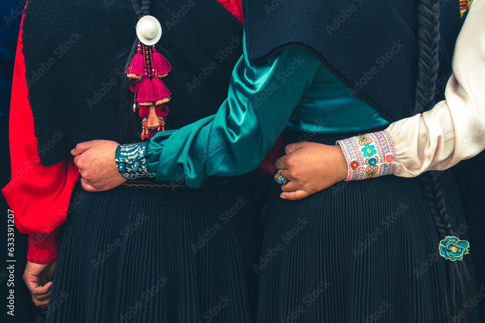 Embroidered details of the clothing of the indigenous woman Saraguro ...