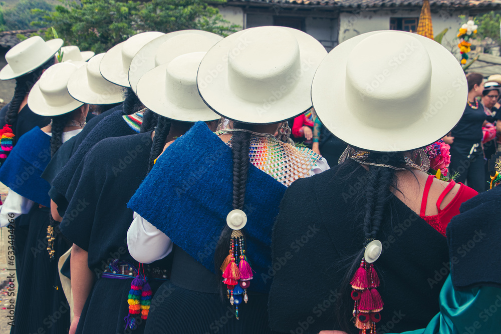 Indigenous women of the Saraguro people dressed in their traditional ...