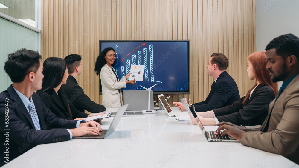 Businesspeople discussing during meeting in conference room. Clean ...