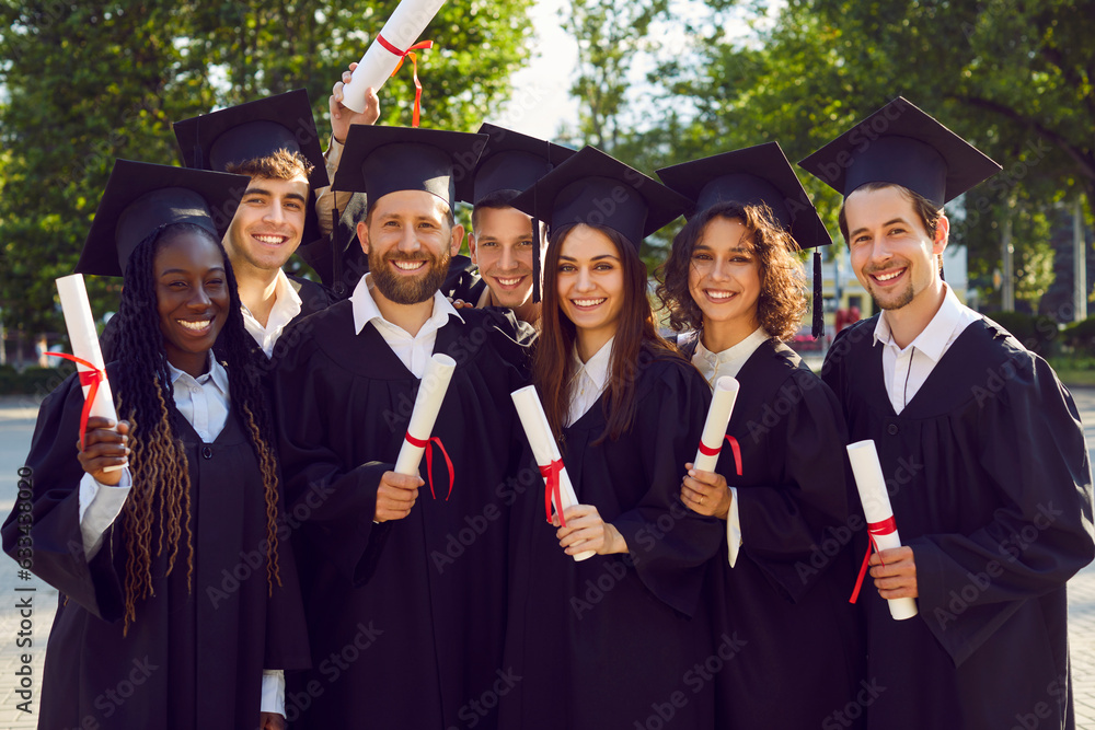Group of several university students on graduation day. Happy diverse ...