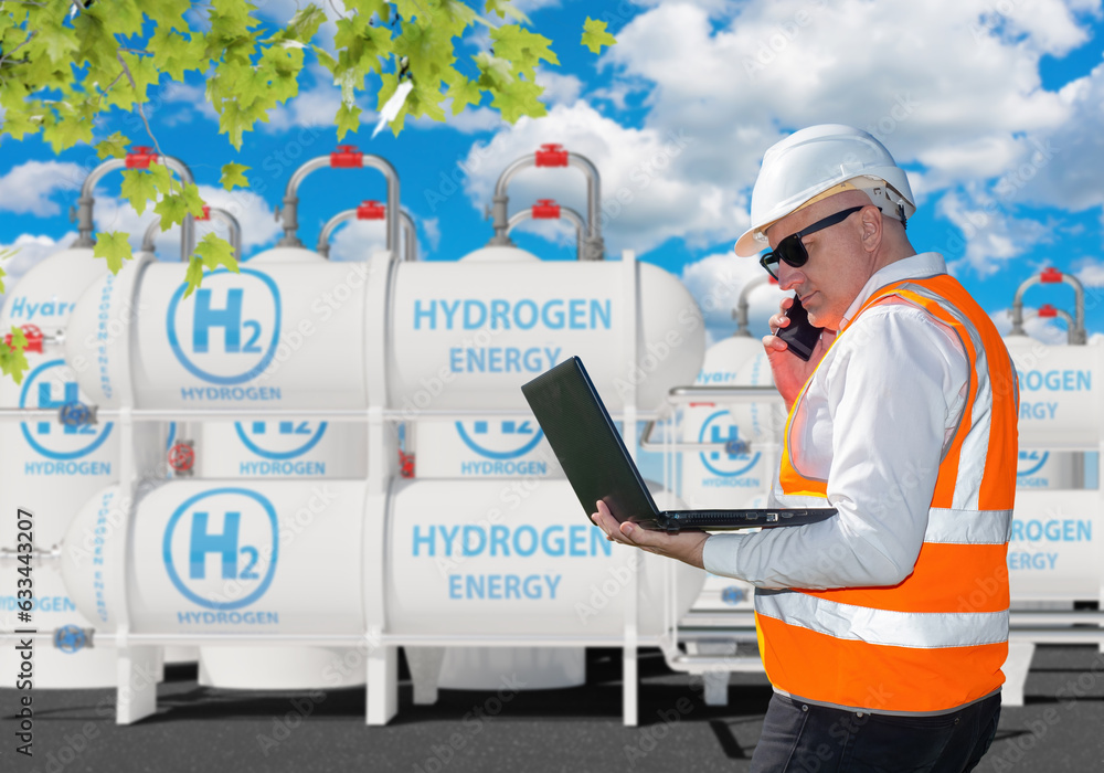 Hydrogen energy. Man engineer with laptop. Guy near hydrogen factory ...