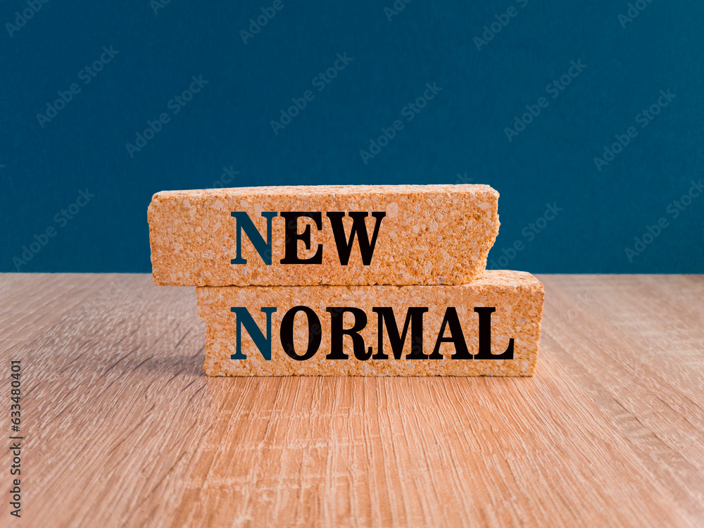 Brick blocks with new normal wording. The world is changing to balance ...