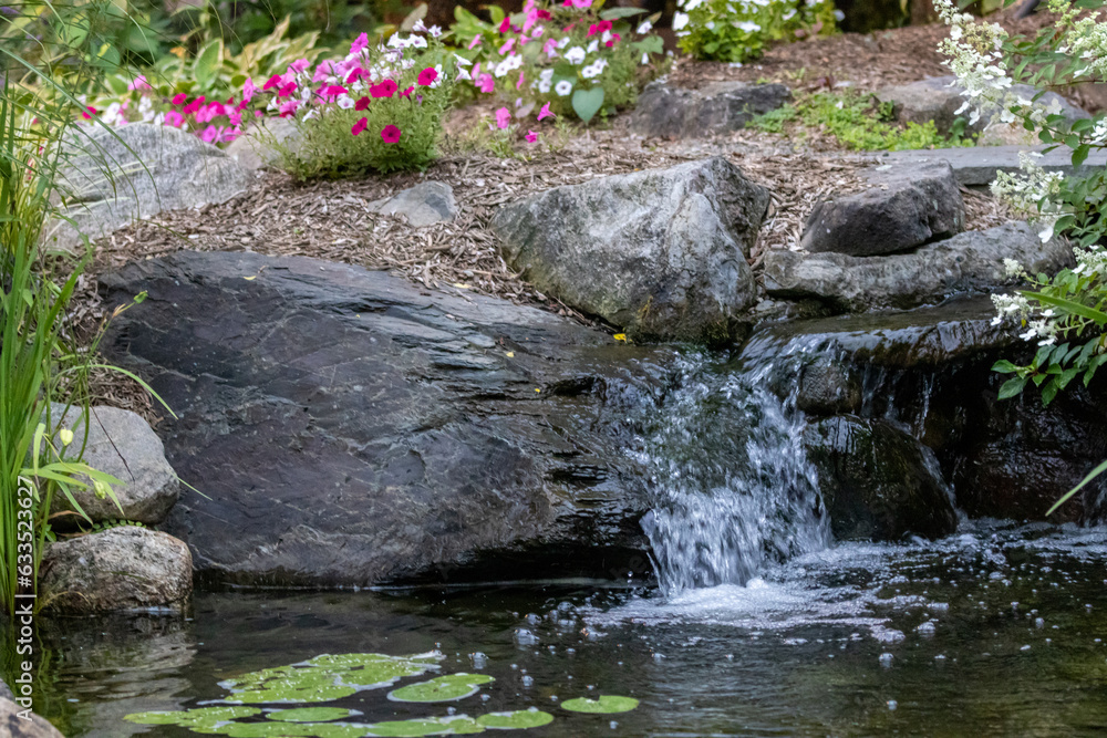 Landscape architecture featuring waterfalls and perennials for backyard ...