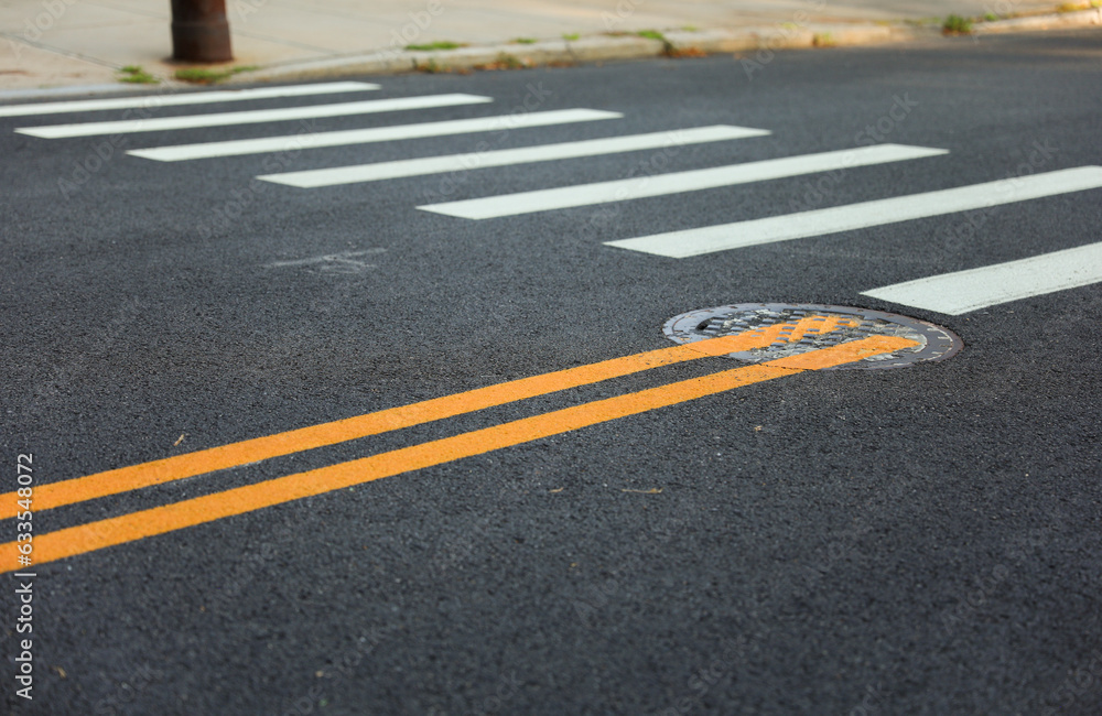 Yellow lines on streets symbolize traffic separation, caution, and no ...