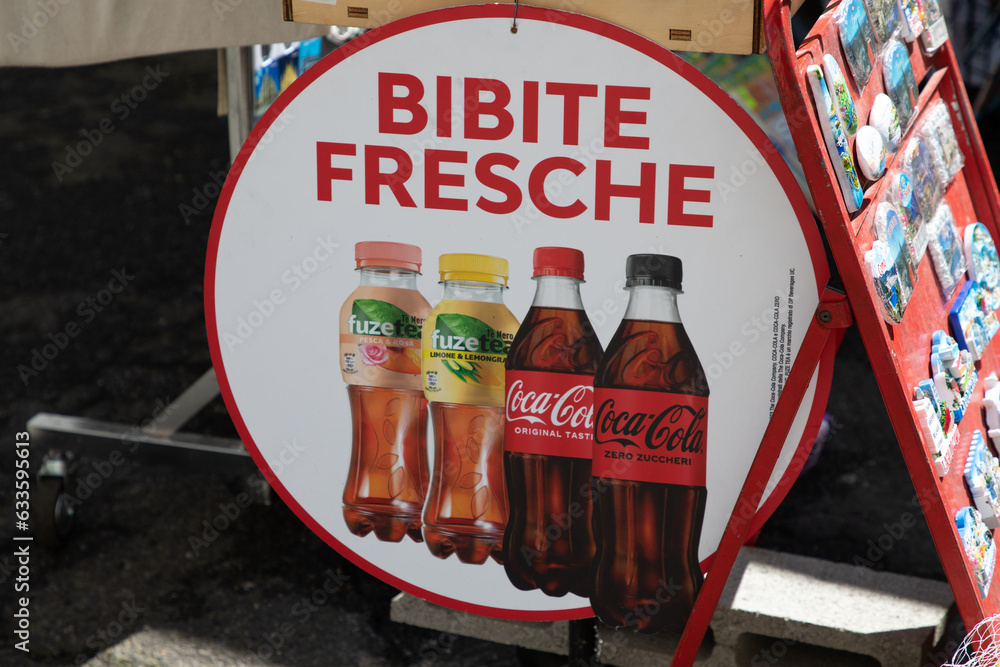 Coca Cola bibite fresche drink advertisement sign logo and text brand carbonated soft drink ...
