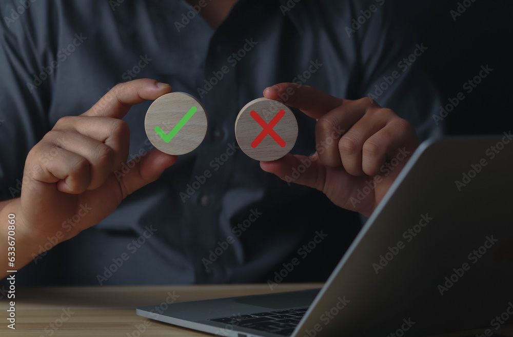 Businessmen think and choose between right and wrong symbols. True and ...