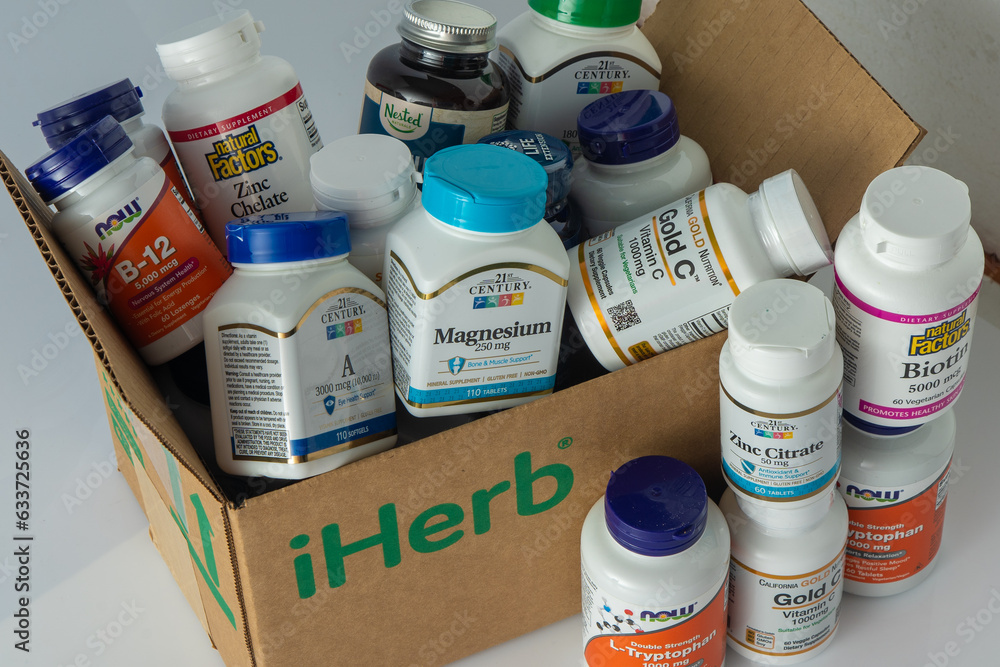 Vitamins, minerals and micronutrients from iHerb box. Lots of different ...
