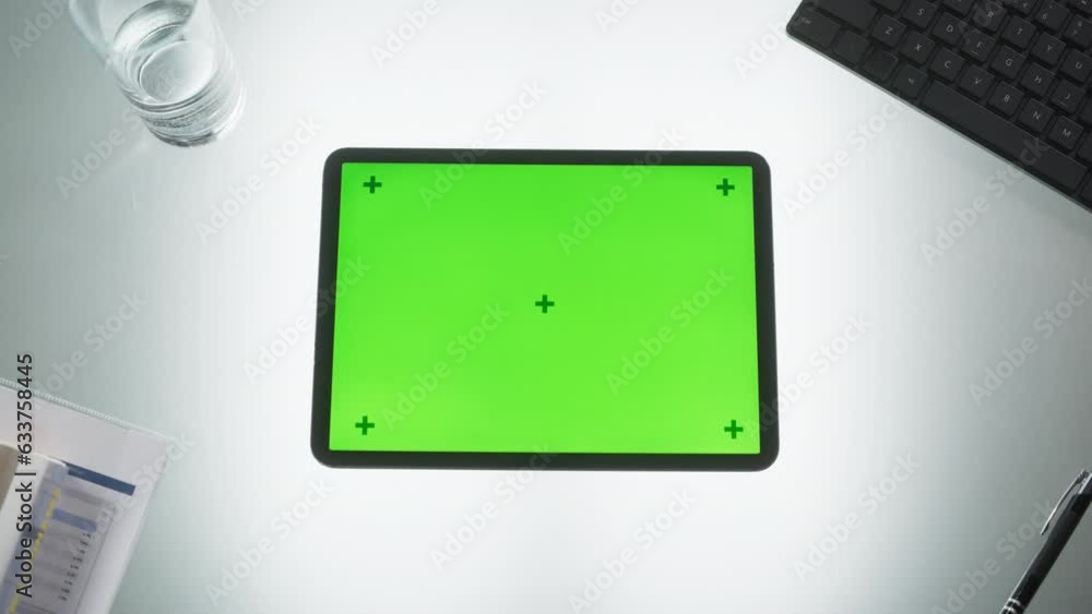 Top Zoom Out View of a Tablet Computer with Mock Up Green Screen ...