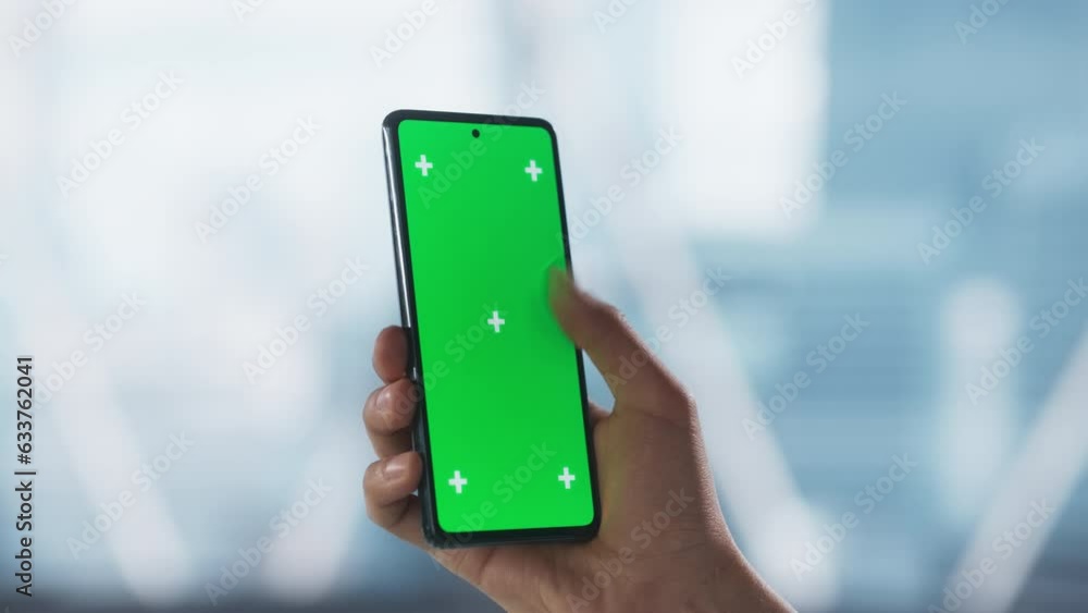 Business Manager Scrolling Through Apps on Smartphone with Green Screen ...