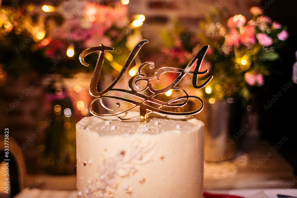 The first letters of the names of the bride and groom on the wedding ...