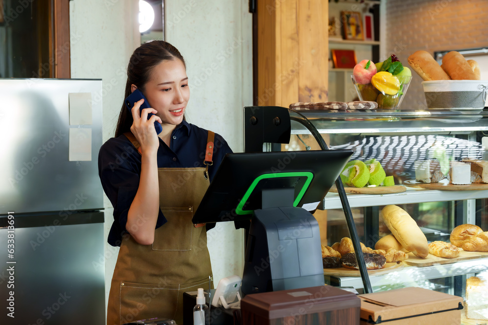 Beautiful Asian woman owns cafe, takes orders in shop herself, woman ...
