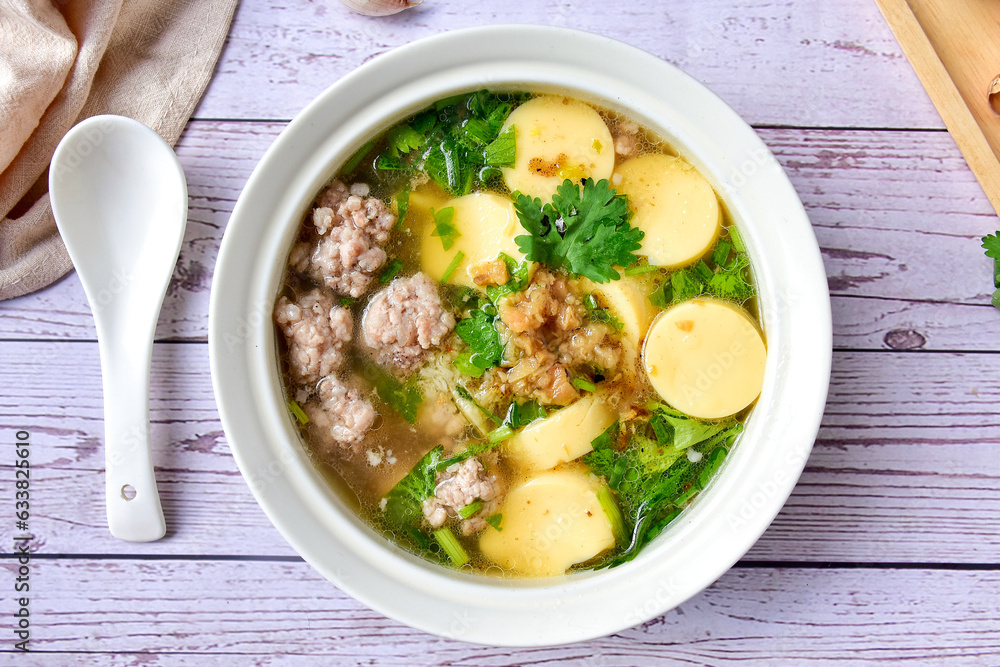 Clear Soup with Egg Tofu ,vegetable and Minced Pork ball ,top view ...