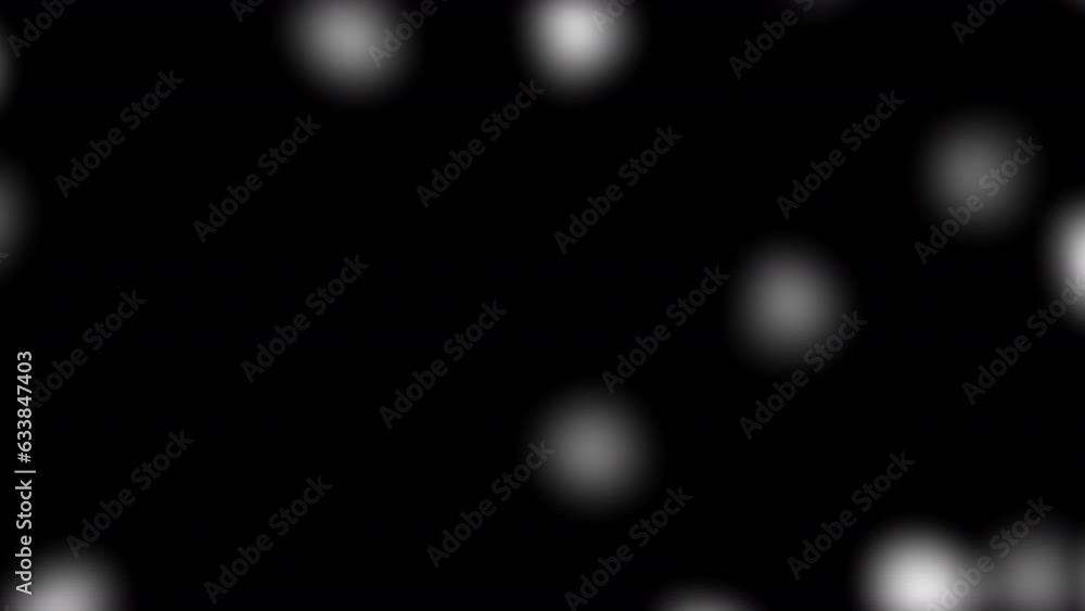 Extra large blurred dust particles on black background. Seamless loop ...
