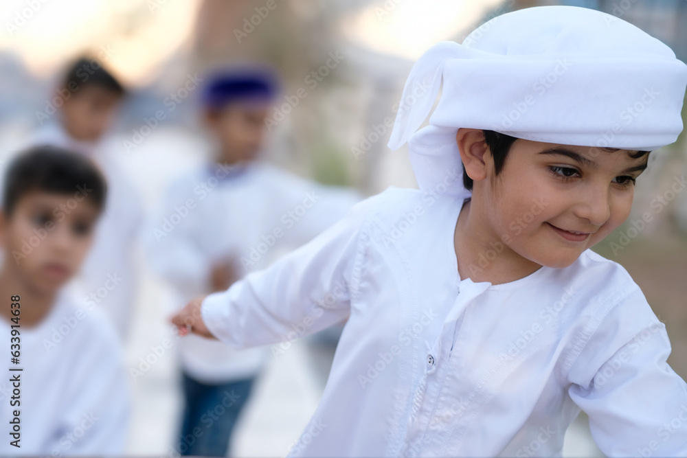 Arab student at school with classmates on the background wearing ...