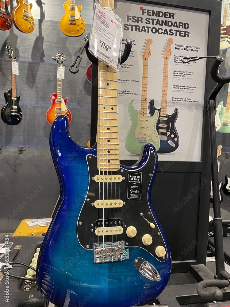 Guitar Center retail store interior blue burst Stock Photo | Adobe Stock