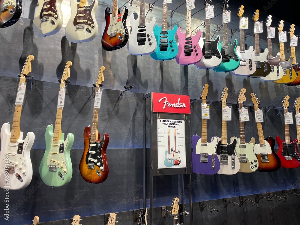 Guitar Center retail store interior wall of guitars Stock Photo | Adobe ...