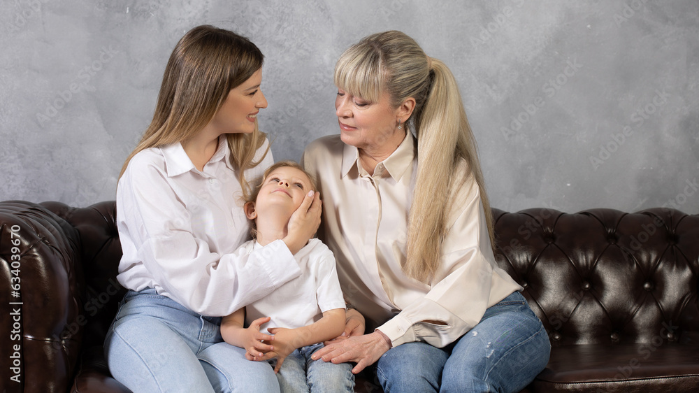 happy family communicates, three generations of women together. Mom ...