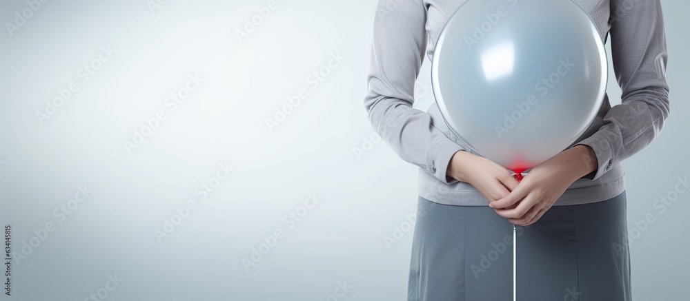 Photo Relieving pain from a bloated stomach with a balloon and needle ...