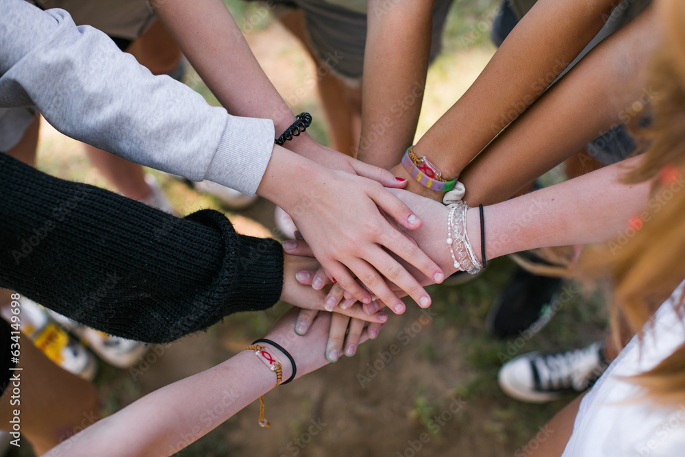 Team of children put hands together.Peaceful Protest kids group and ...