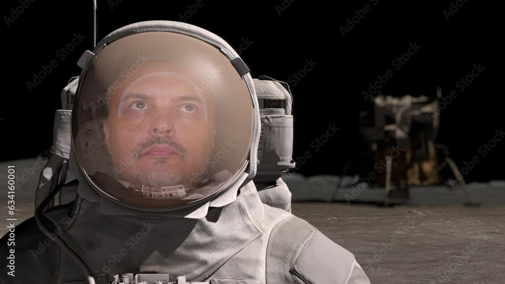 Portrait of man astronaut in outer space wearing helmet looking at ...