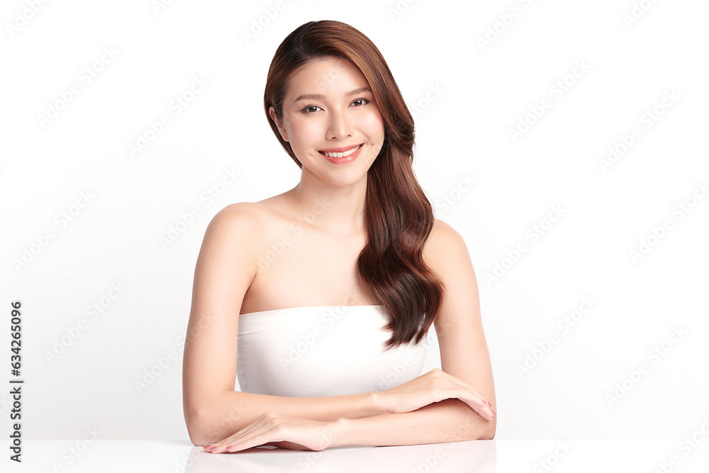 Beautiful young asian woman with clean fresh skin on white background ...