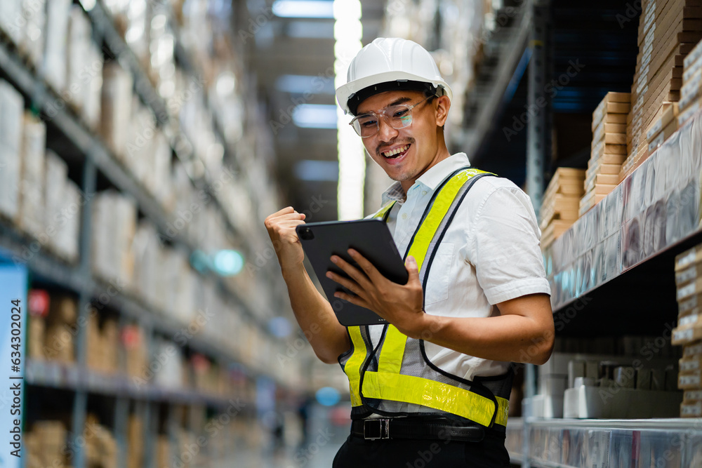 logistics industry concept successful. Asian male warehouse worker ...
