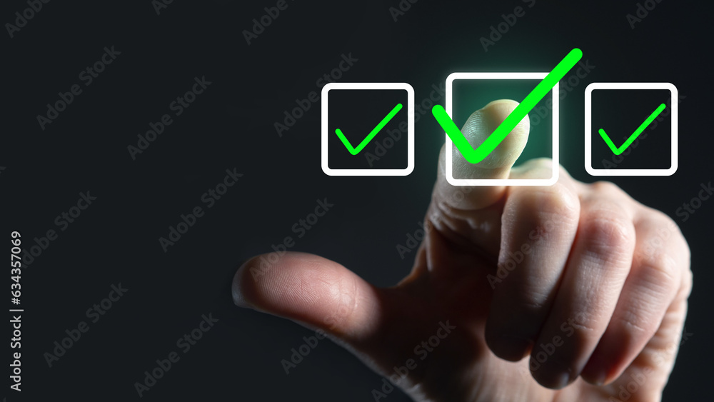 Checkbox near person hand. Finger presses on virtual screen. Checklist ...