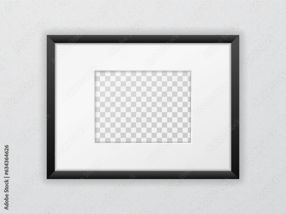 Narrow black frame with passe-partout hanging on the wall. Horizontal ...